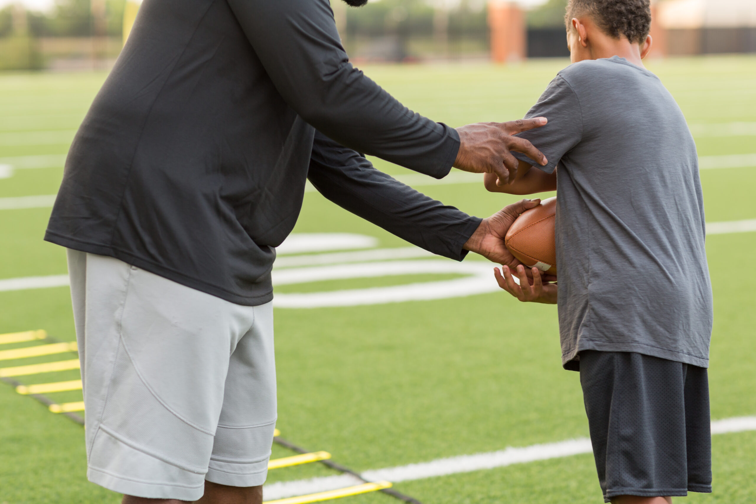 Football,Coach,Training,A,Young,Student,Athlete. - Saint Augustine's ...